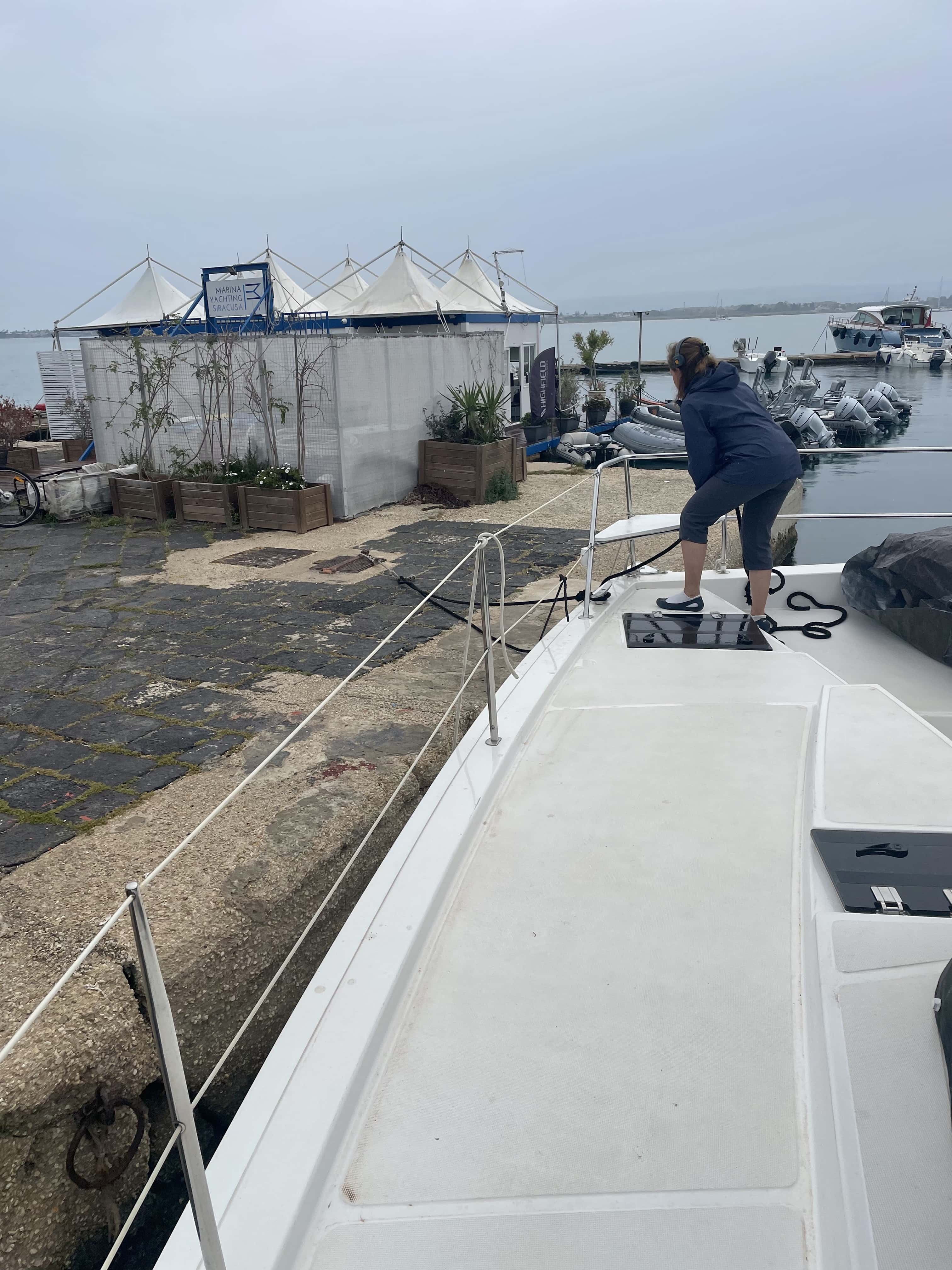 dad-boat-side docking – Sailing Sabática